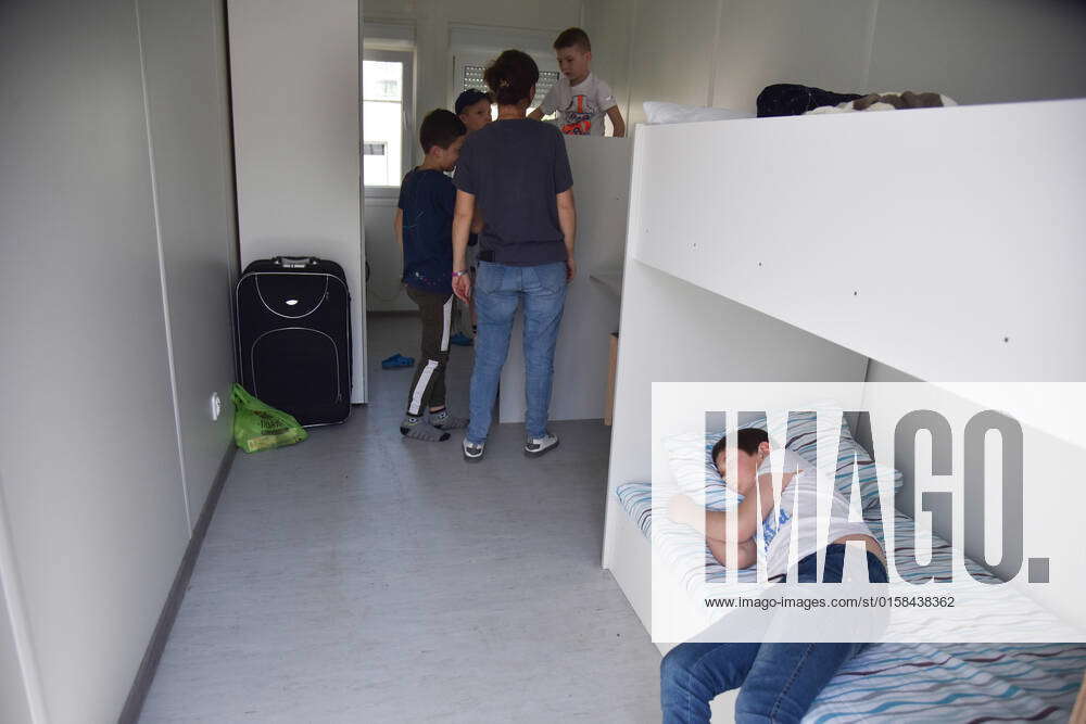 Lviv, Ukraine: People inside a modular building on the territory of a ...