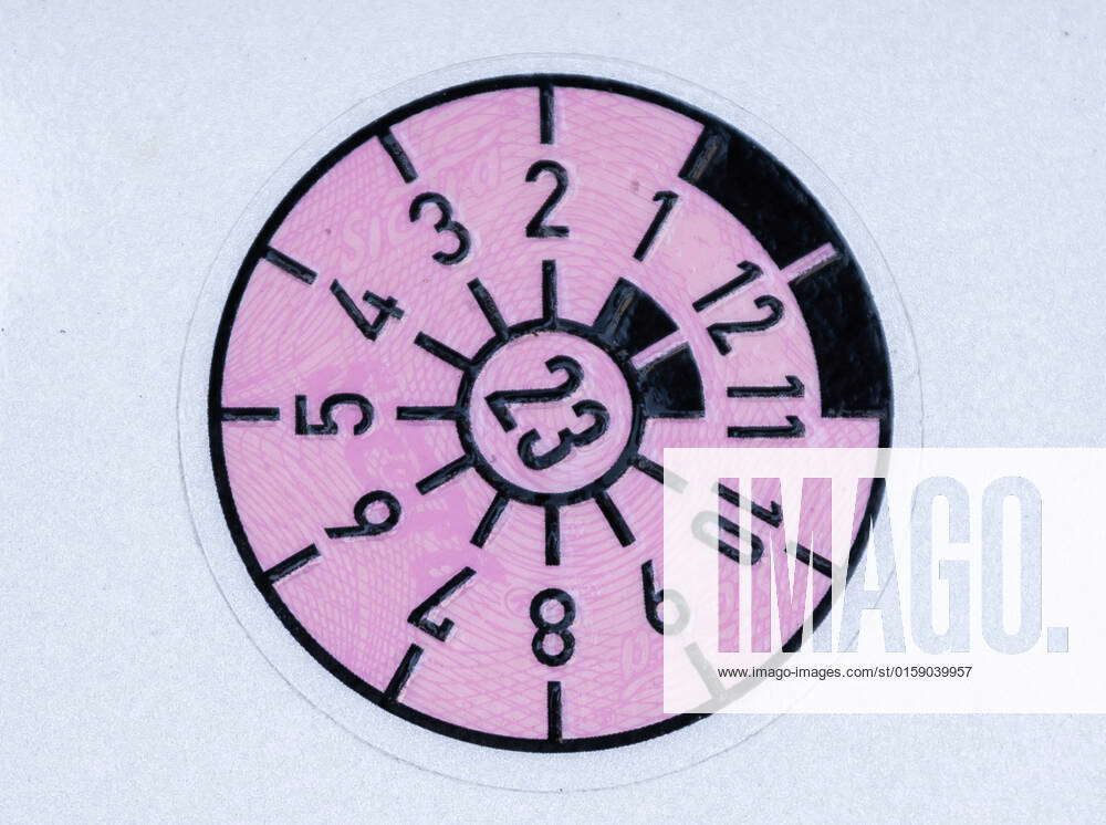 TÜV sticker on a license plate, TÜV test mark on the car until 2023 ...