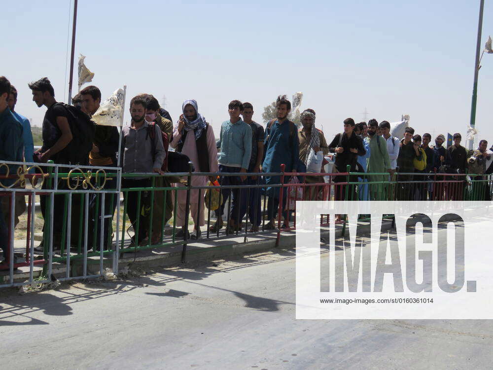 NIMROZ, Afghan refugees wait to return at a border crossing point in ...