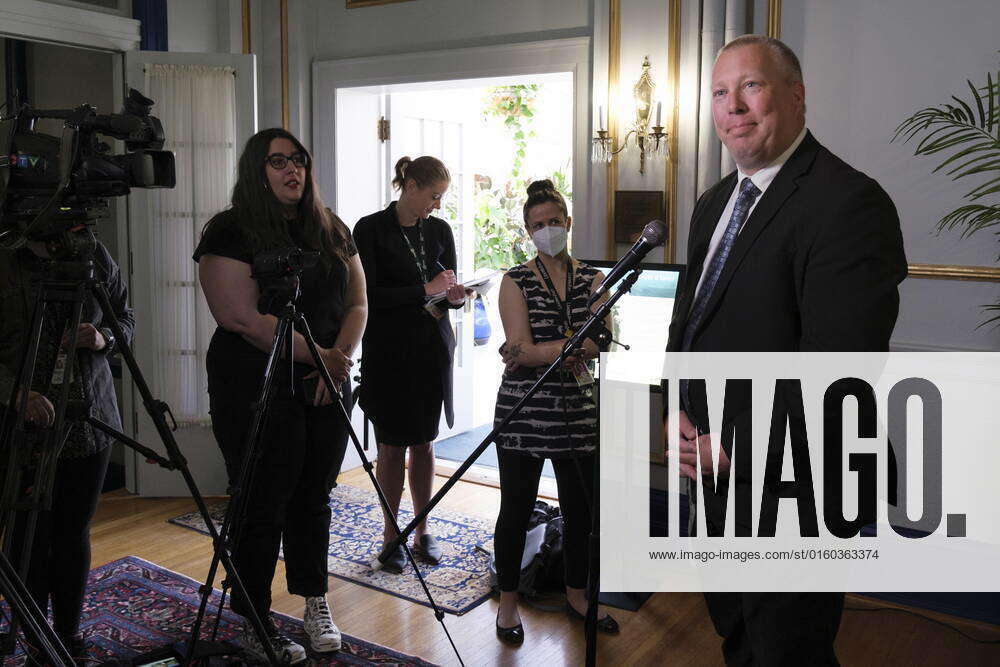 Regina, Saskatchewan, Canada: Gene Makowsky, right, Minister of Social ...