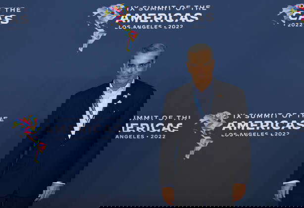 The President of the Dominican Republic, Luis Abinader (C), waves ...