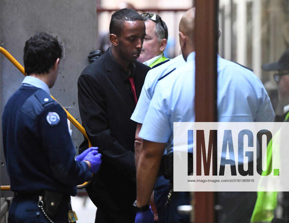 ALI KHALIF SHIRE ALI COURT, Ali Khalif Shire Ali (second from left ...