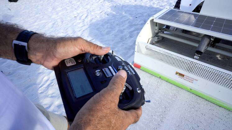 Florida, USA: xx, operating the BeBot, a remote controlled robot ...