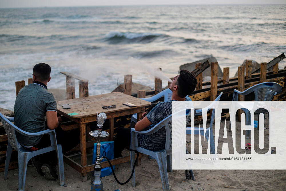 Gaza, Palestine: Palestinians enjoying their time in the midst of a ...
