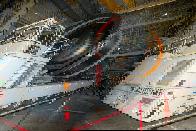 NASA AND BOEING ENGINEERS INSPECT AND PREPARE ONE OF THE LARGEST ...