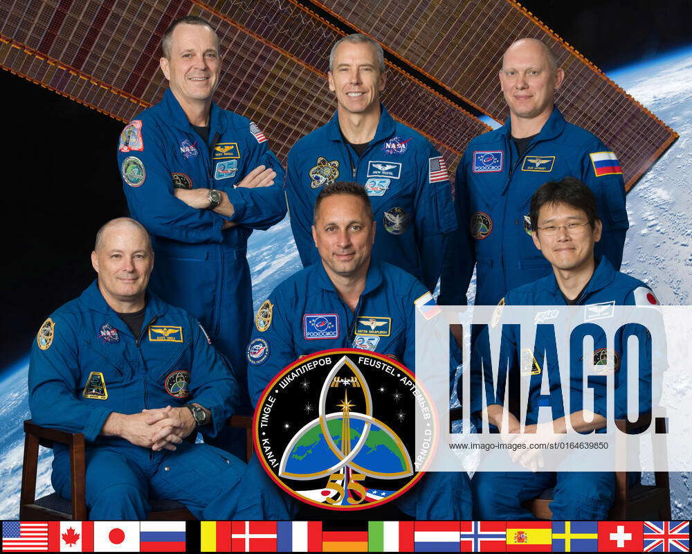 Iss055-s-002 (Oct. 6, 2017) --- The six-member Expedition 55 crew poses ...