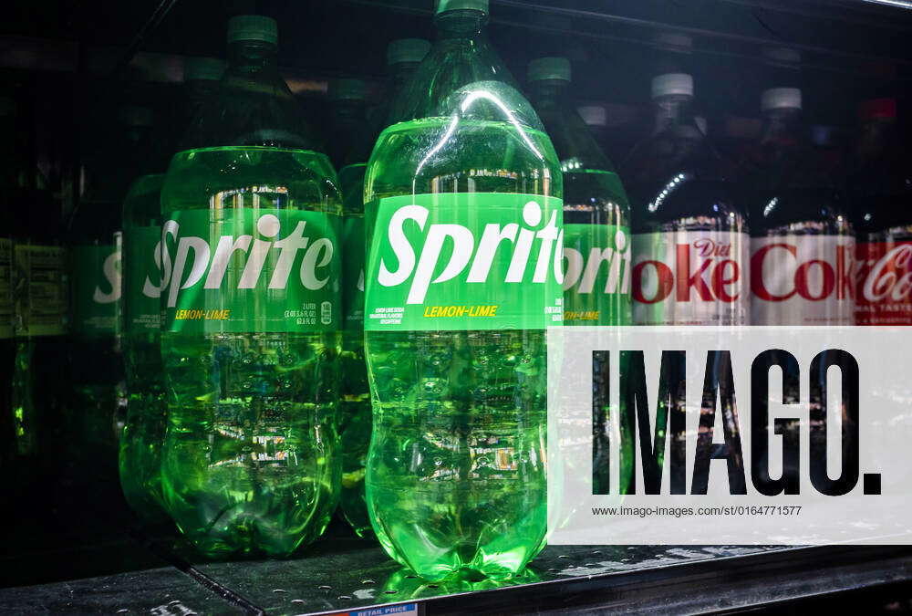 New packaging for Sprite Bottles of Sprite in their green plastic are ...