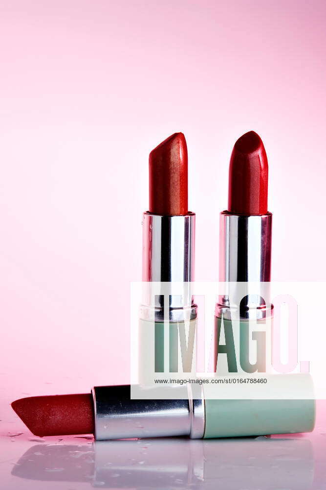 Three lipsticks with pink cast Y