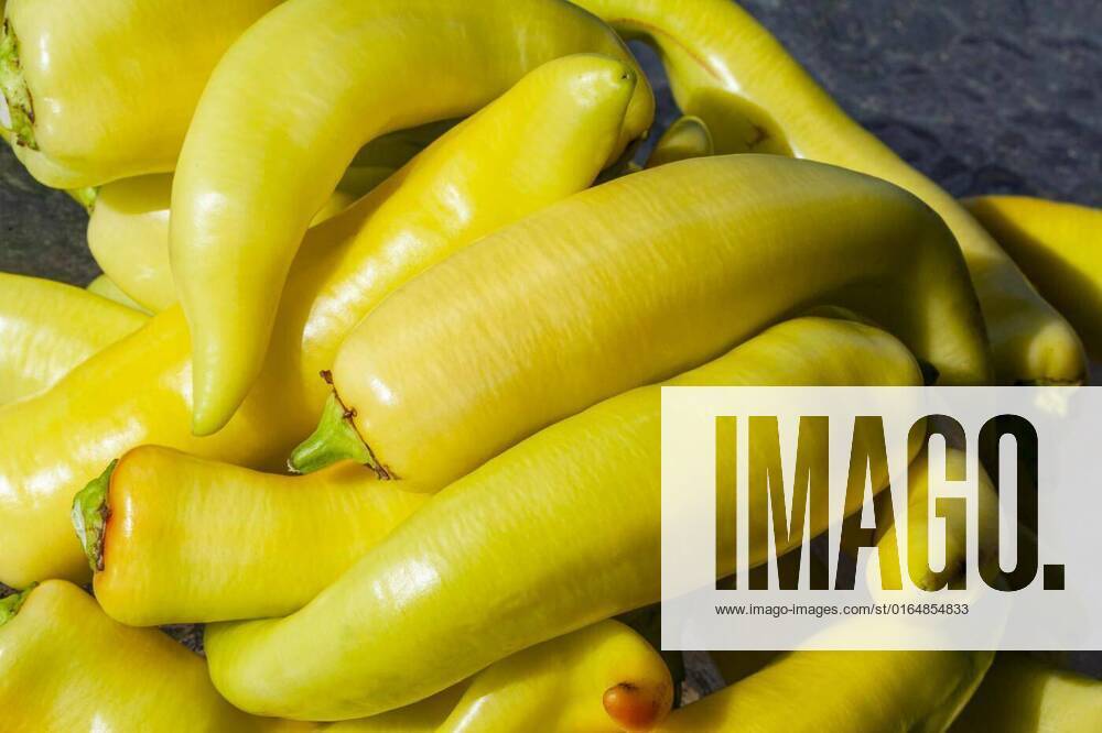 Yellow Peppers, A backdrop of stacked yellow peppers