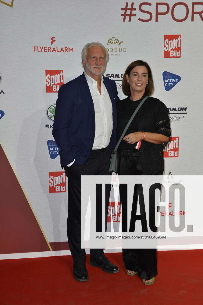 Rudi Voeller with his wife Sabrina Voeller on arrival at the SPORT BILD ...