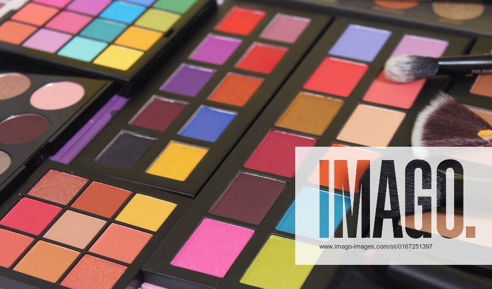 Brightly Colored Cosmetic Pigment Palettes With Various Cosmetics ...