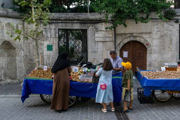 : People shopping in the historic Uskudar bazaar in Istanbul, Turkey on ...