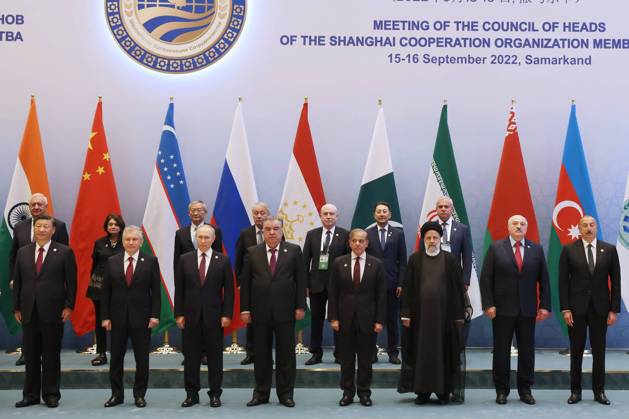 A family photo before the meeting in an expanded format at the Shanghai Cooperation Organisation