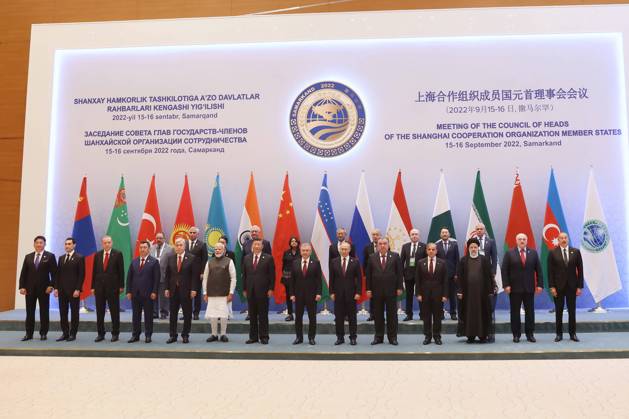 A family photo before the meeting in an expanded format at the Shanghai Cooperation Organisation