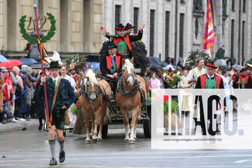Oktoberfest Algund float with band at the traditional costume and rifle ...