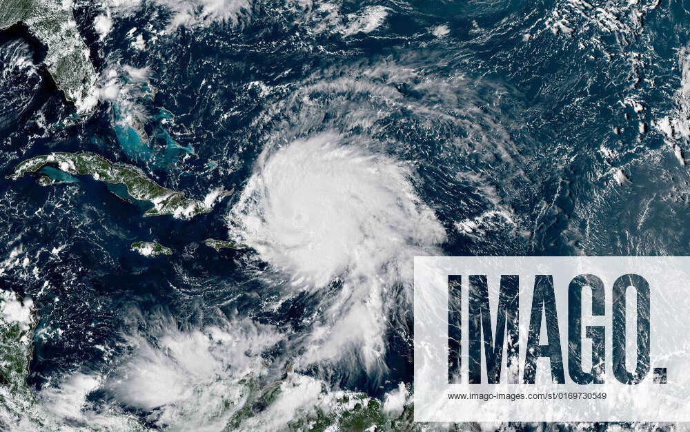 September 19, 2022, MODIS NOAA, EARTH ORBIT: Hurricane Fiona as it moves north east across the
