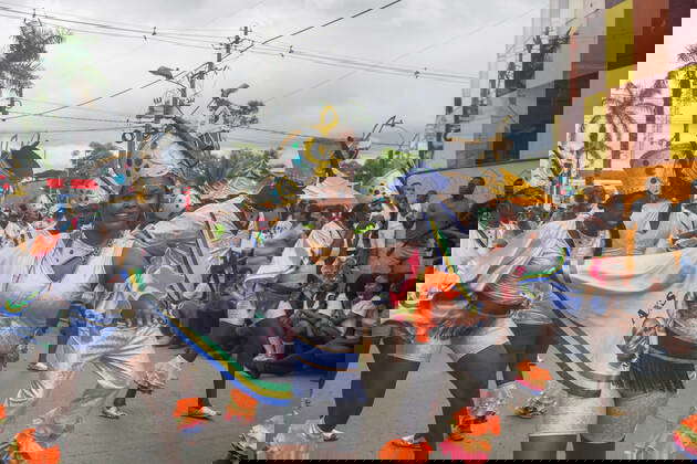 Quibdo, Colombia: A group of people wear a costume before the parades ...