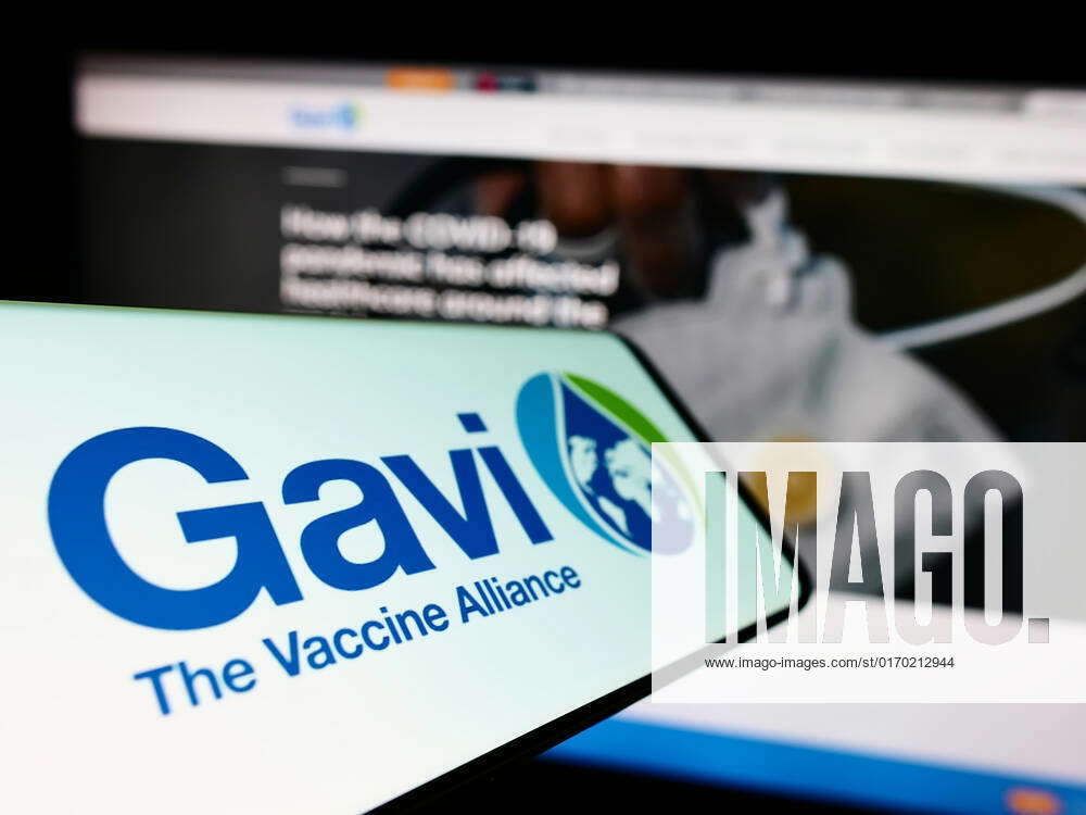 Mobile phone with logo of health partnership Gavi, the Vaccine Alliance ...
