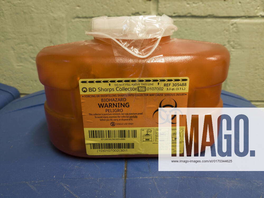Medical waste collection A full sharps container in an apartment ...