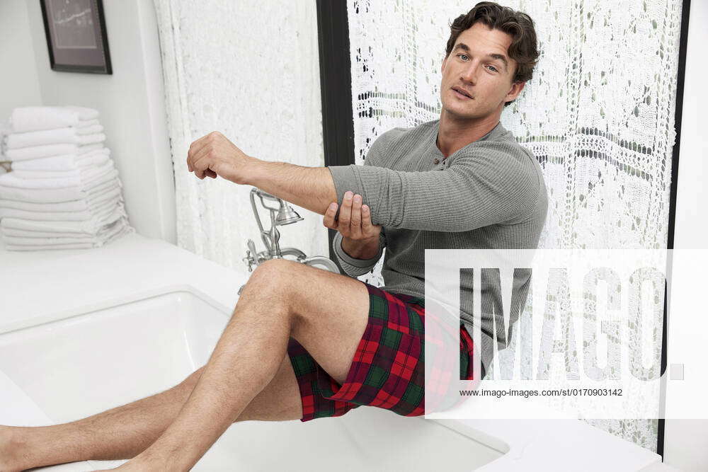 Tyler Cameron models navy thermal pajama set, starring in PJ Place s ...