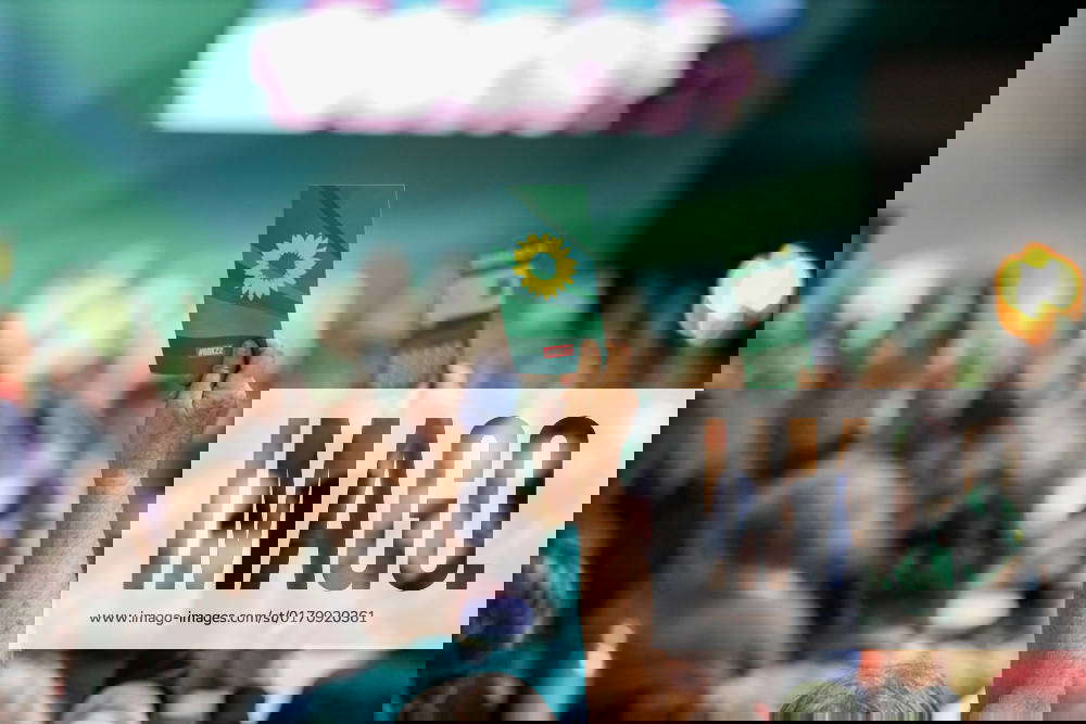 Symbol image Voting on a motion The delegates raise the voting card The ...