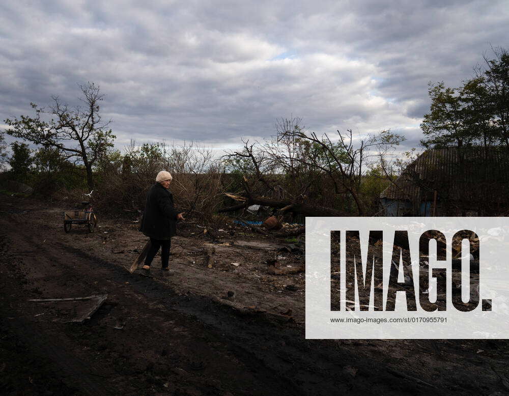 October 14, 2022, Lyman, Ukraine: A resident of Lyman seen carrying a ...
