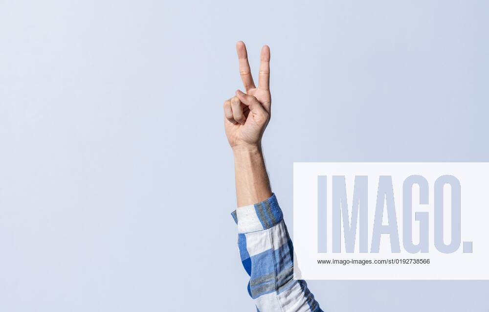 Hand gesticulated the Letters V in Sign Language at a isolated ...