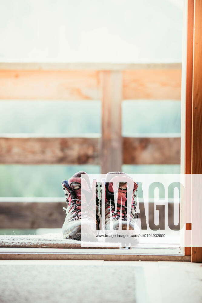 Hiking boots inside of a rustic mountain chalet, Austria Hiking boots ...