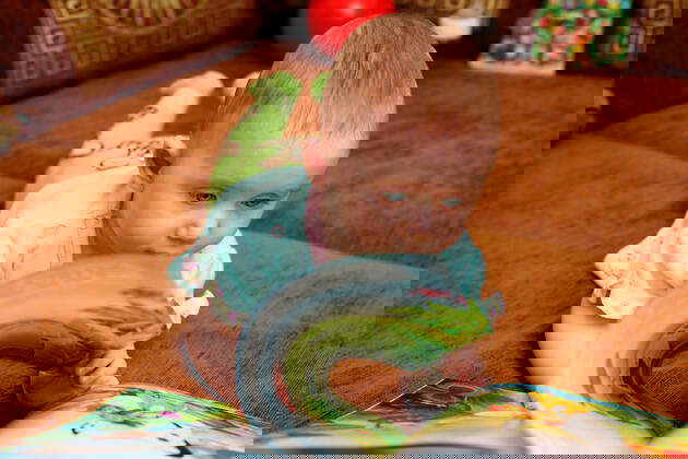 Curious Little Baby with a Book on the Sofa, model released, 8243588 ...