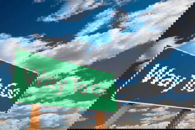 Go With The Flow Green Road Sign with Dramatic Clouds and Sky., model ...