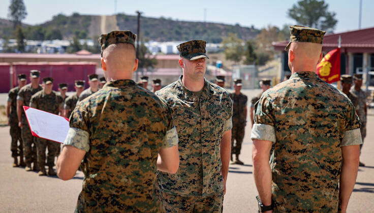 U.S. Marine Corps Gunnery Sgt. Colin G. Baird, a geospatial analyst ...