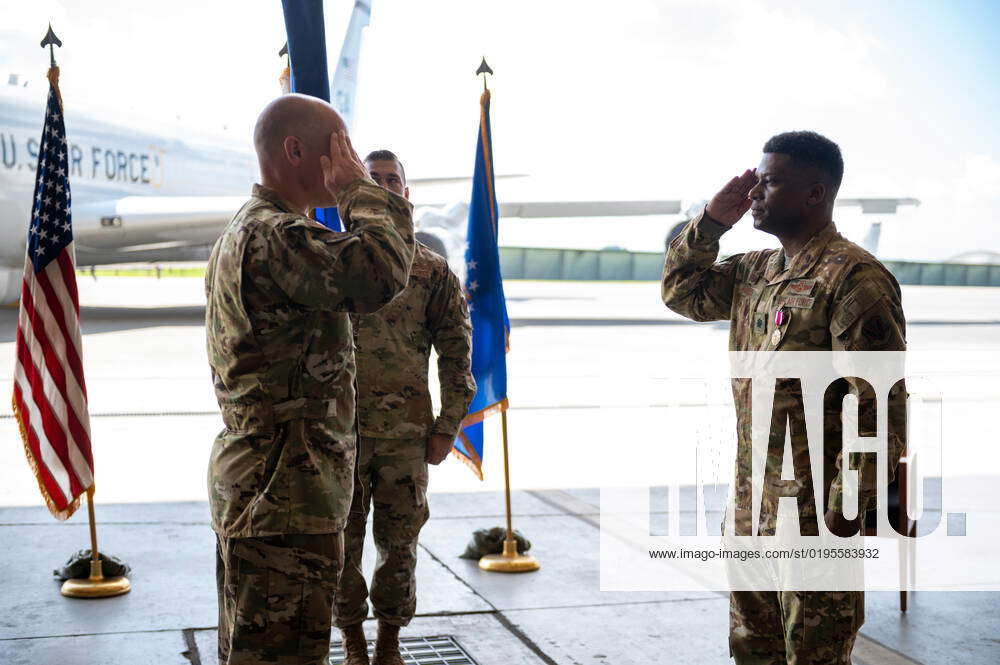 U.S. Air Force Lt. Col. Joseph Hayes Jr. (right), renders his final ...