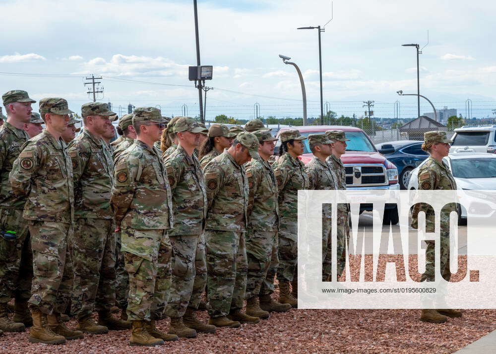 U.S. Air Force members of the 233rd Communications Squadron stand at ...