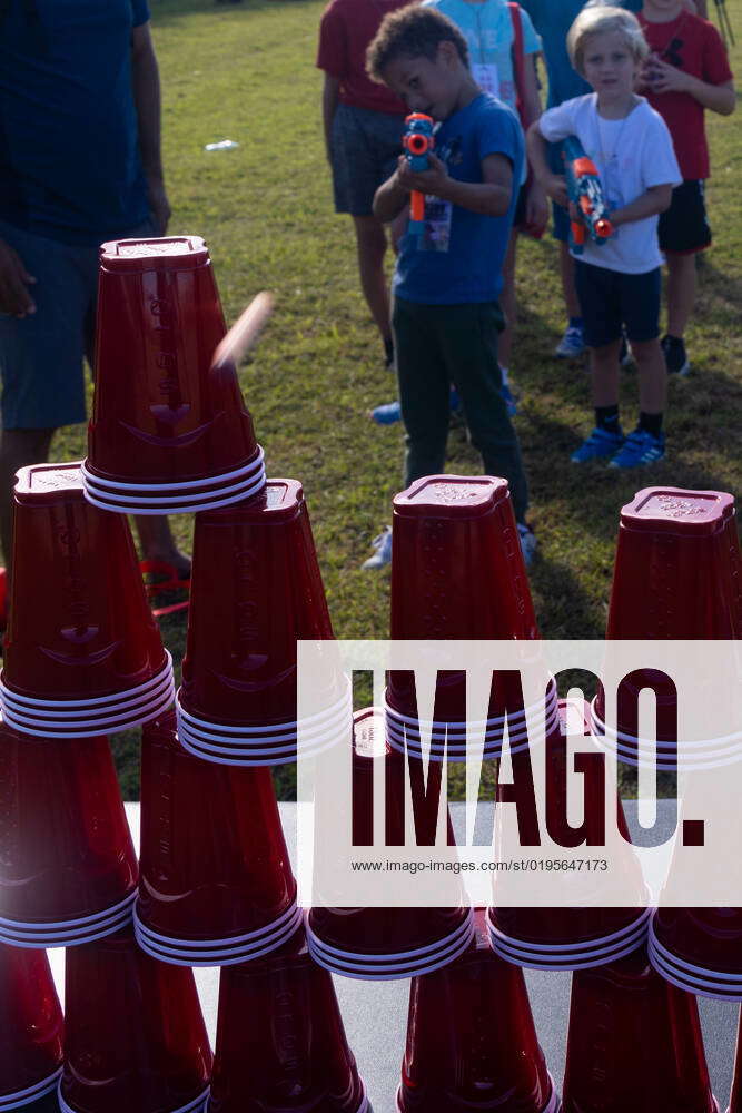 Military children participate in the marksmanship event during Kids ...