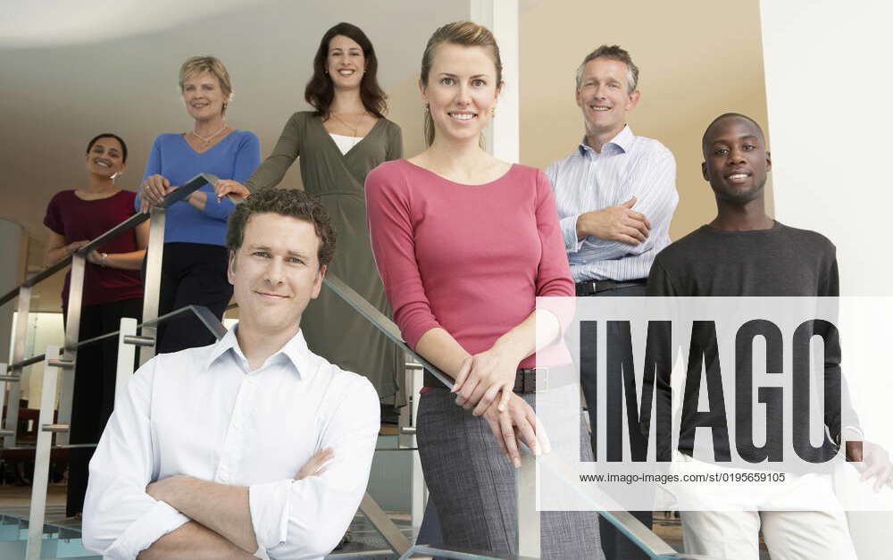 Group of Office Workers Posing on Office Steps portrait, model released ...