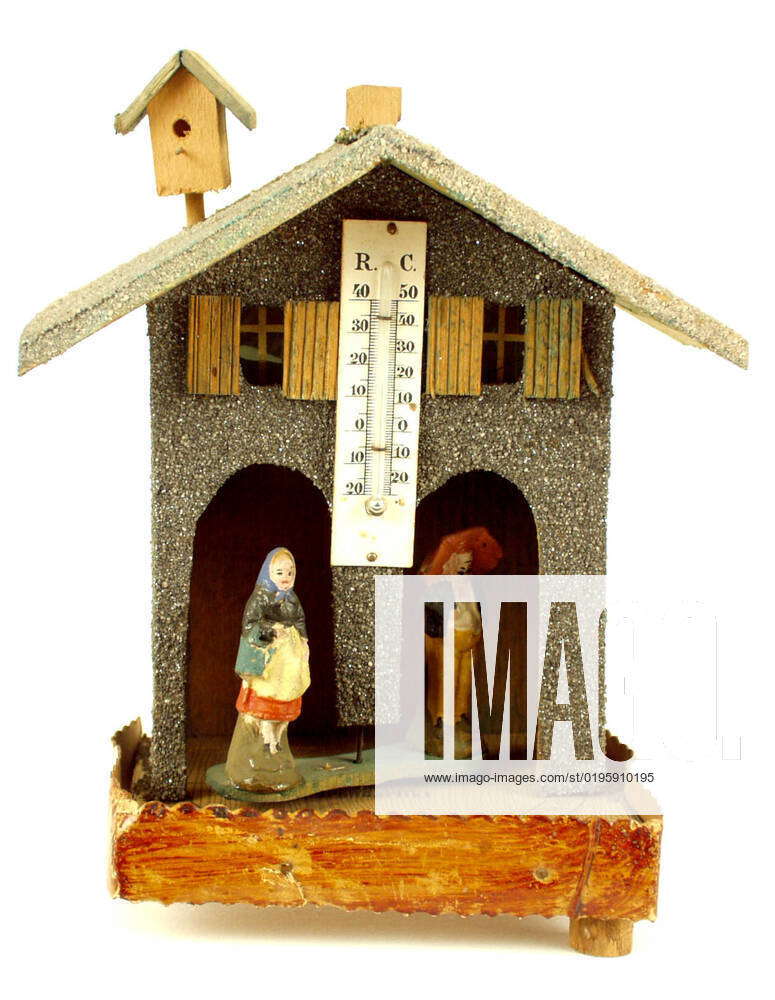 Barometer Barometer with thermometer. Small house of wood with old man ...