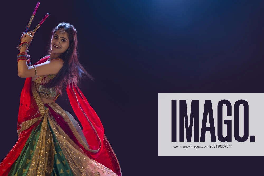 Gujrati woman performing Garba on stage