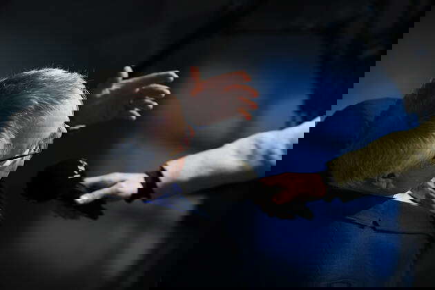 PS Andre Frederic talks to the press ahead of a plenary session of the ...