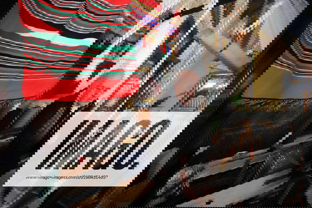 Palestinian man Akram al-Yaziji, 65, weaves on wooden loom Palestinian ...