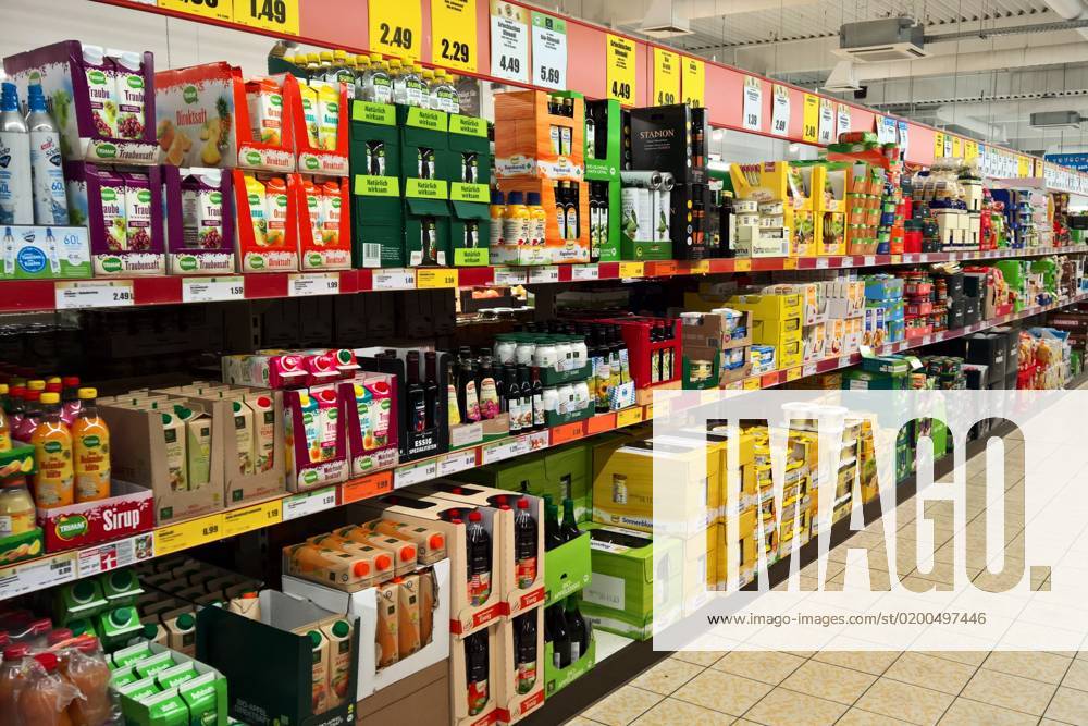 Norma food discount store, supermarket photo shelf with juice, vinegar ...