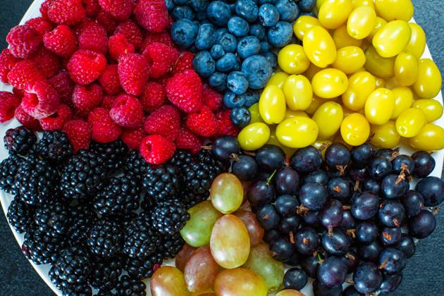 Diverse array of vibrant exotic fruits presented in a tantalizing ...