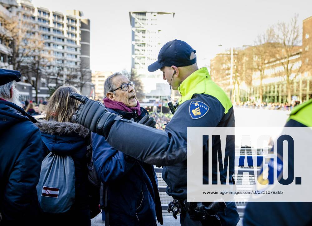 THE HAGUE The police send bystanders away during a demonstration in ...