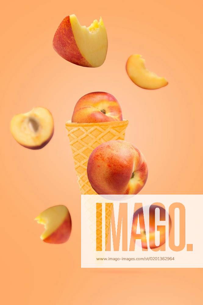 Isolated peaches on the air in ice cream waffle cone, Falling ice cream ...