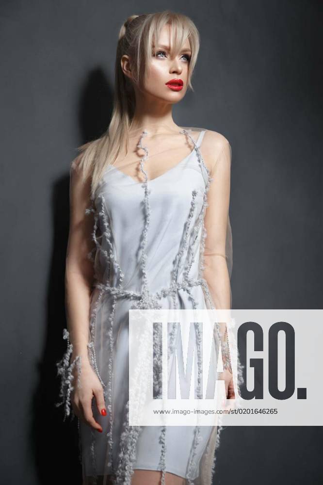Beautiful girl in designer fashionable transparent clothes, Beautiful ...