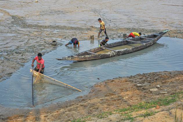 Traditional Fishing in Sylhet, Bangladesh. 27 February 2023 in Sylhet ...