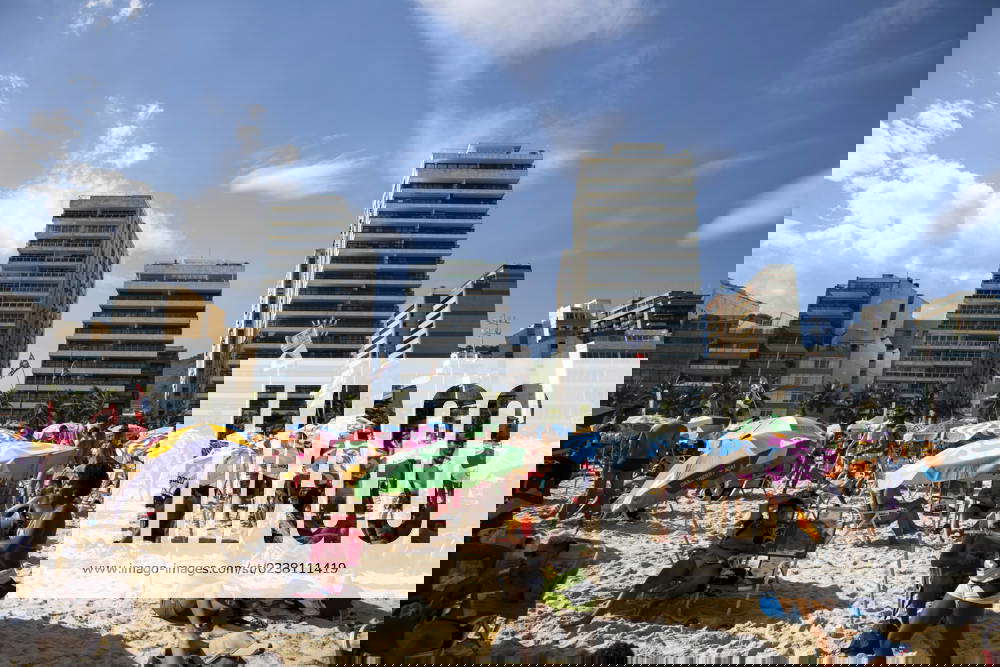 Travel Destination - Brazil People enjoy a sunny summer day in Ipanema ...