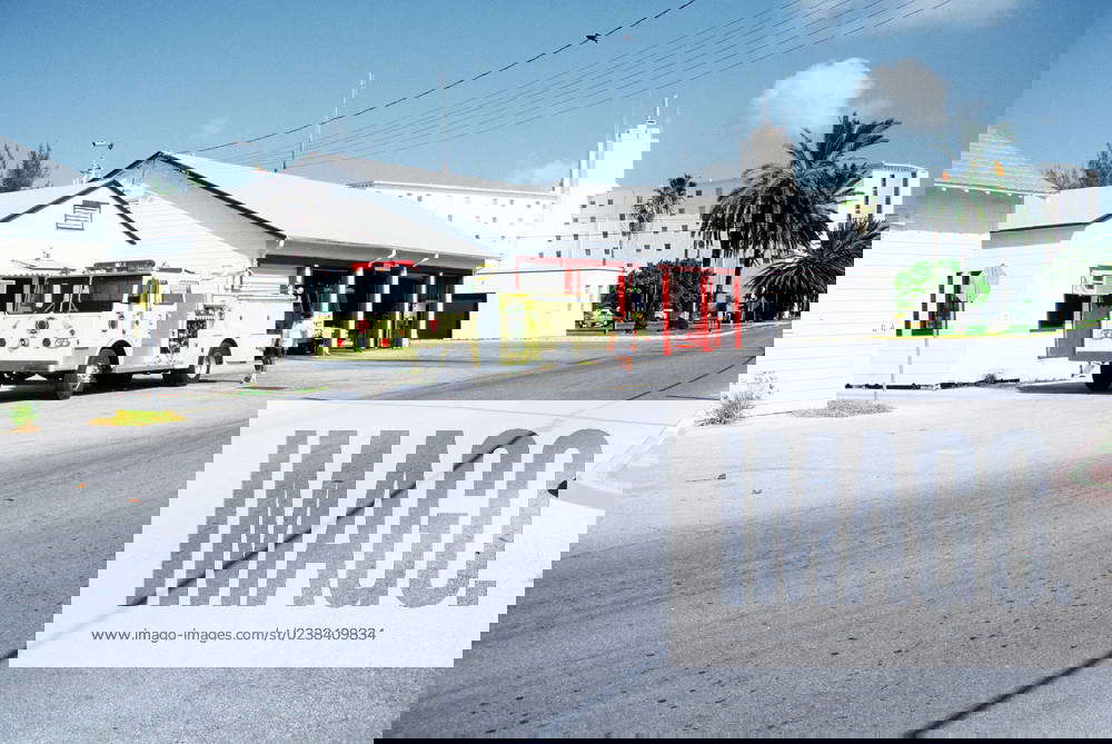 A fire truck is parked in front of the Trumbo Point Fire Station. Base ...