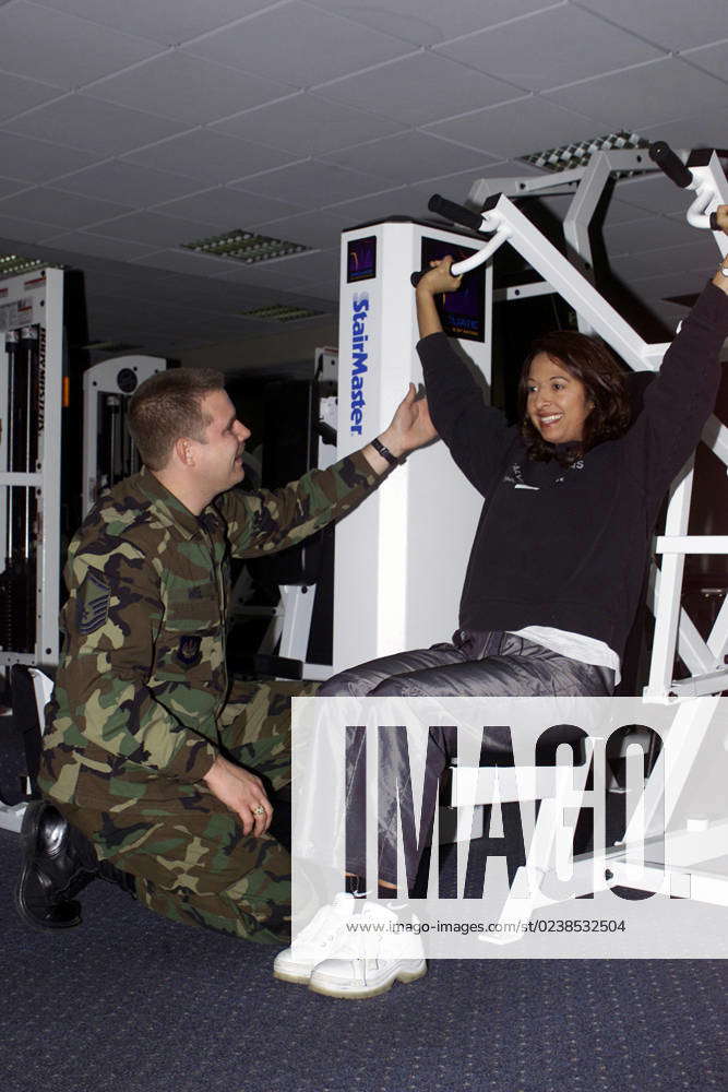 Superintendent MASTER Sergeant Anthony Wise, USAF, of the shows Helen Hornsby the proper techniques