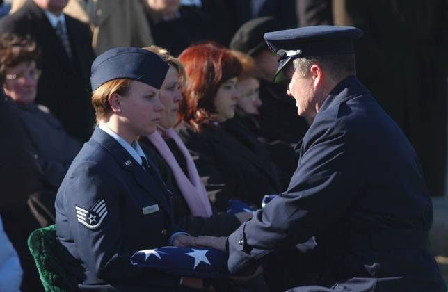 F-1342G-006. Complete Scene Caption: US Air Force Colonel Dana B. Demand, Commander, 105th Airlift
