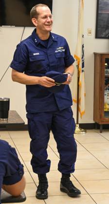 Rear Adm. John W. Mauger, commander, 1st District (right), discusses ...